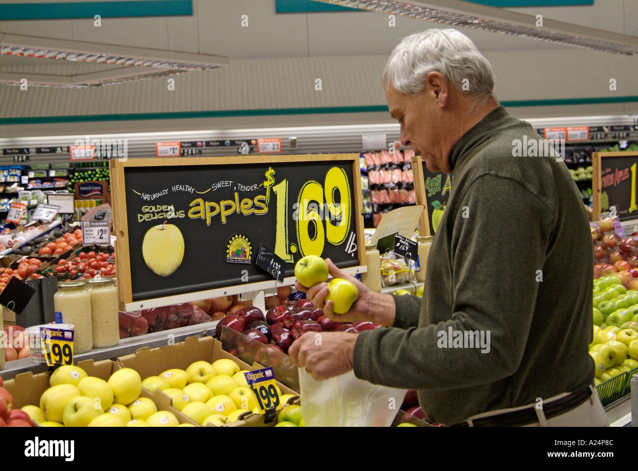 Consumer shops in a modern food super market for food Stock Photo - Alamy