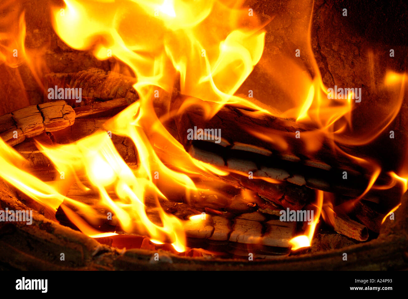 Glowing flames and embers in wood fire Stock Photo - Alamy