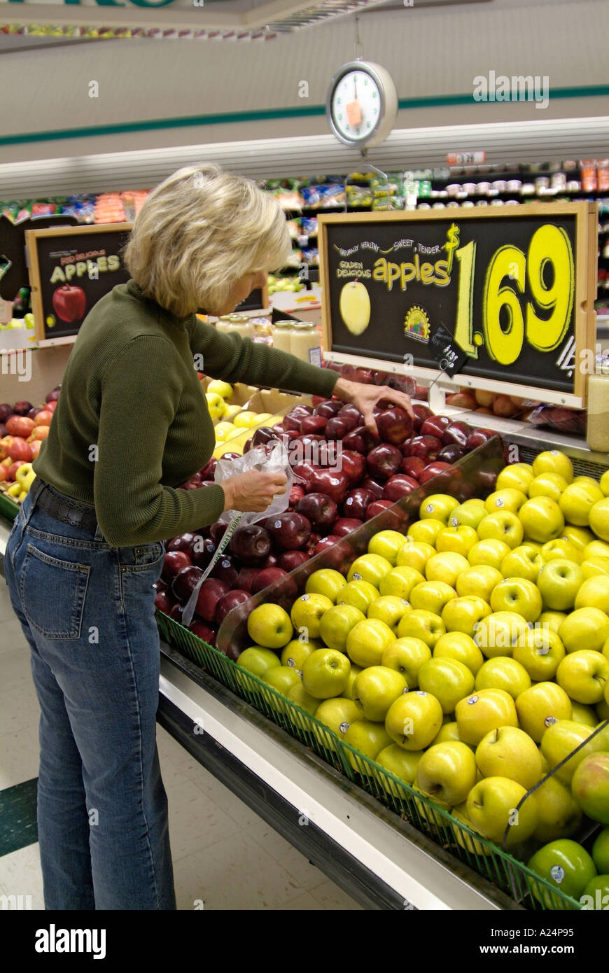 Consumer shops in a modern food super market for food Stock Photo - Alamy