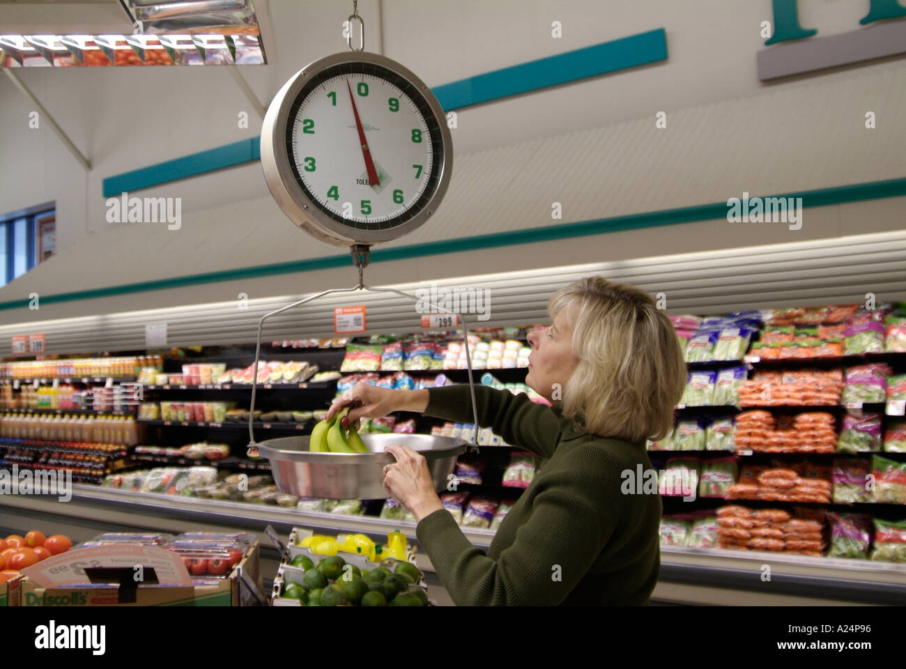 Consumer shops in a modern food super market for food Stock Photo - Alamy