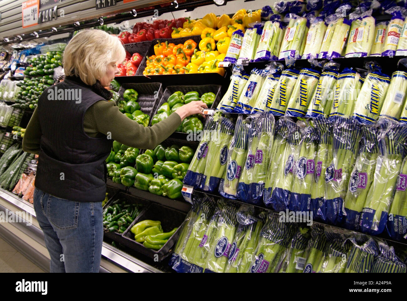 Consumer shops in a modern food super market for food Stock Photo - Alamy