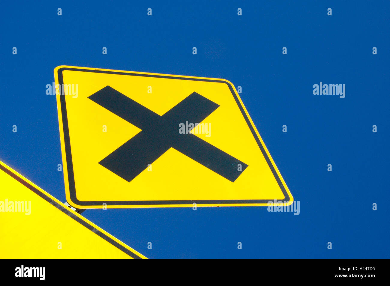 cross roads ahead signs for drivers to see on freeway and roads and ...