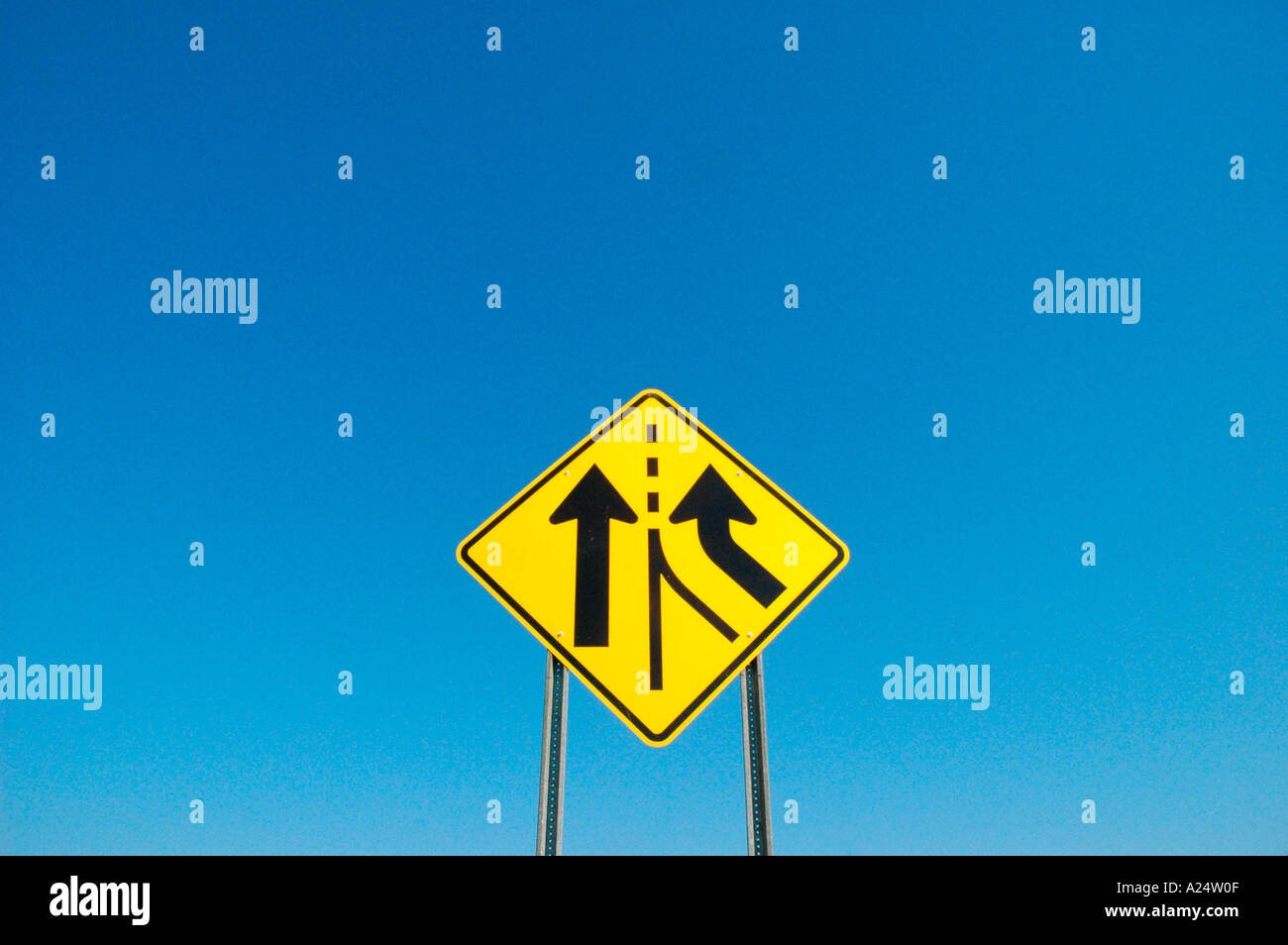 Sign of roadway showing new lane on the right of ongoing traffic Stock ...