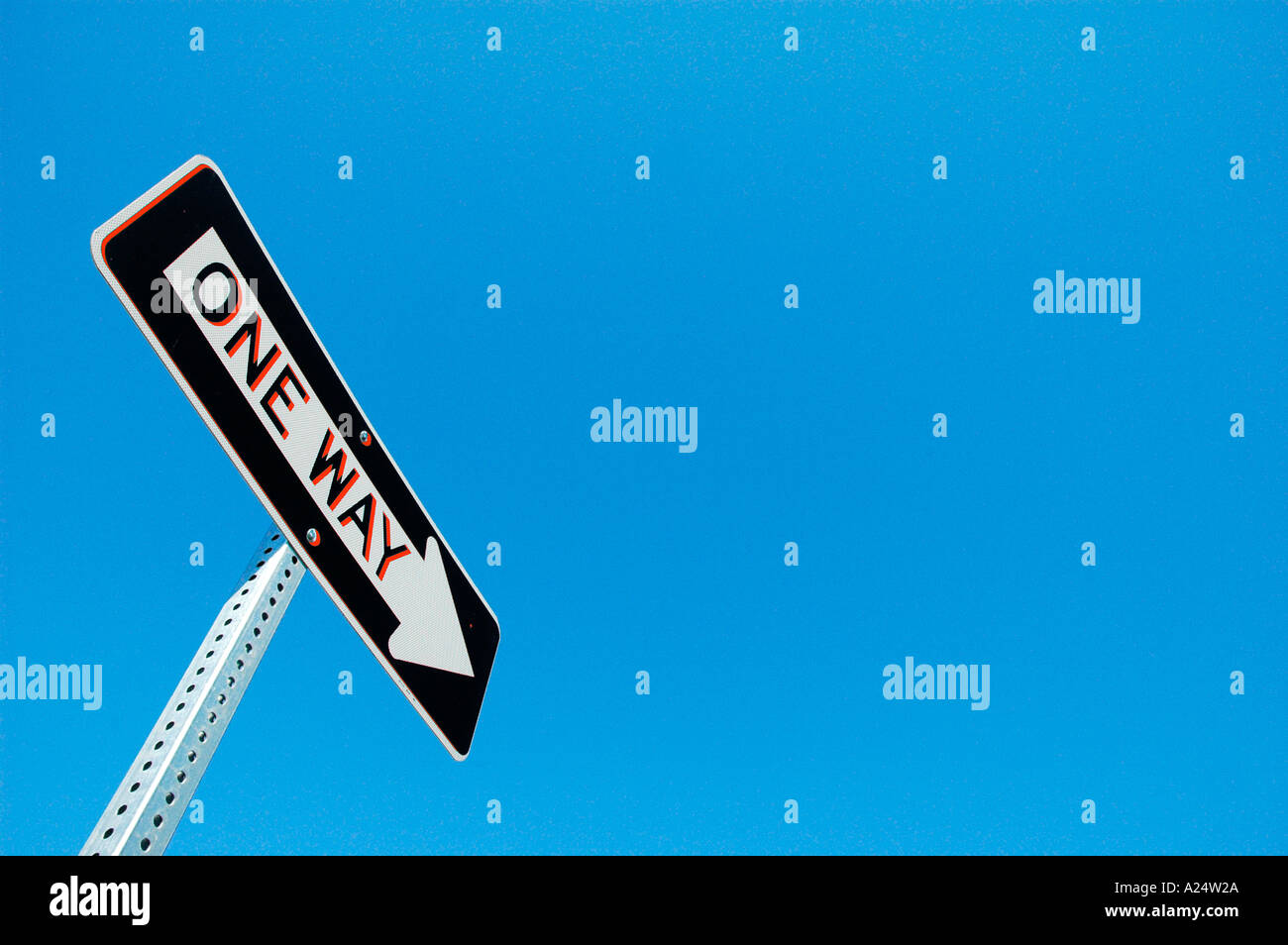 roadway one way sign showing which way to go on the streets Stock Photo ...