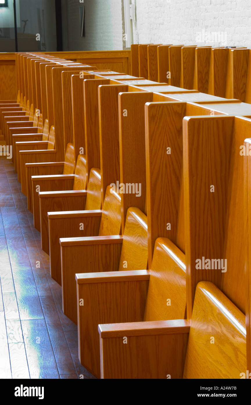 Wooden pews in monastery sanctuary Stock Photo - Alamy