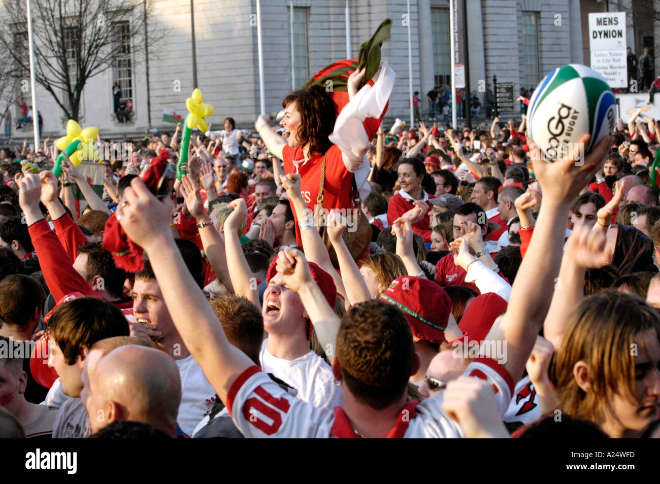 Welsh rugby fans outside in Cardiff celebrating a Six Nations ...