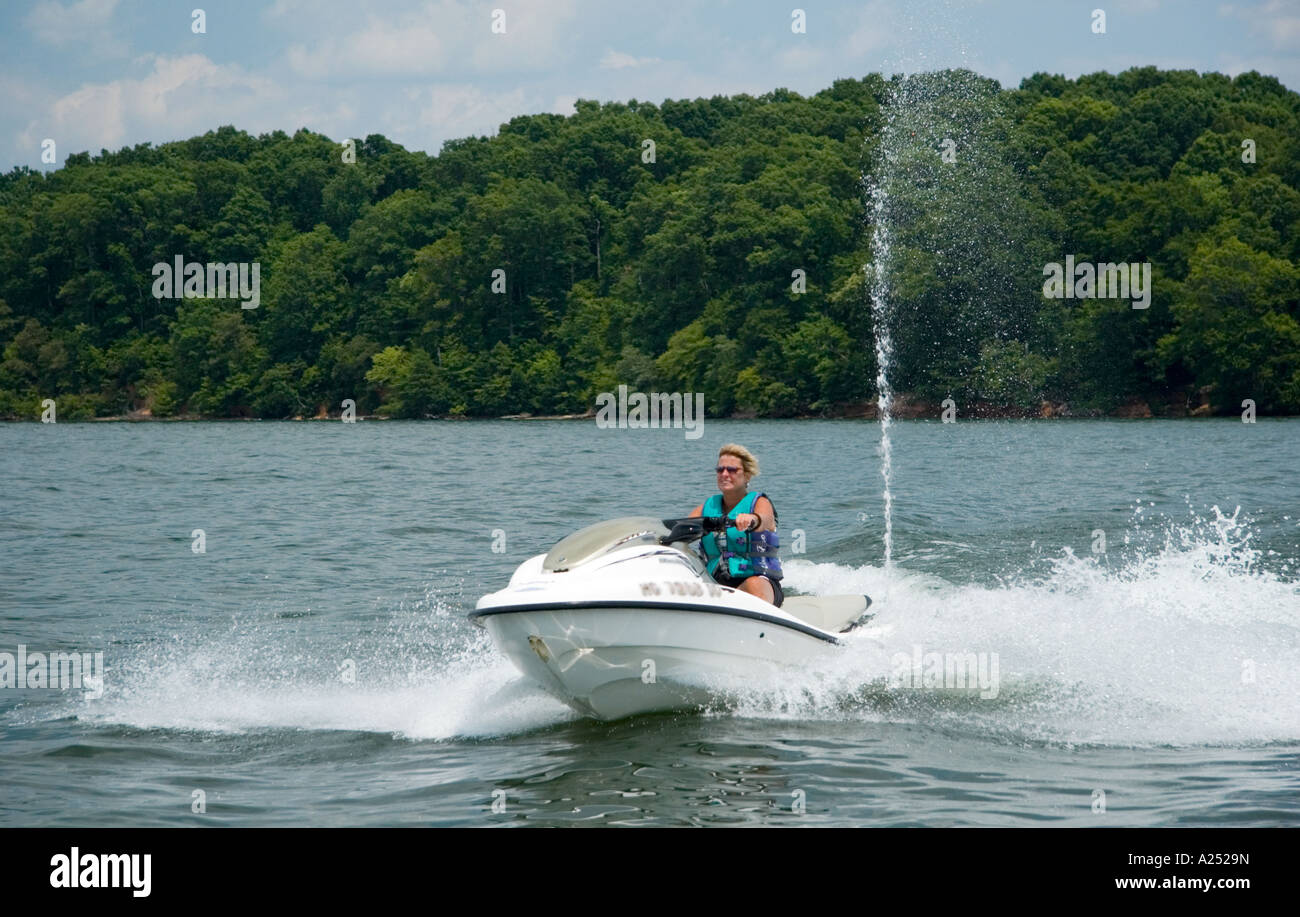 Woman on jet ski Stock Photo - Alamy