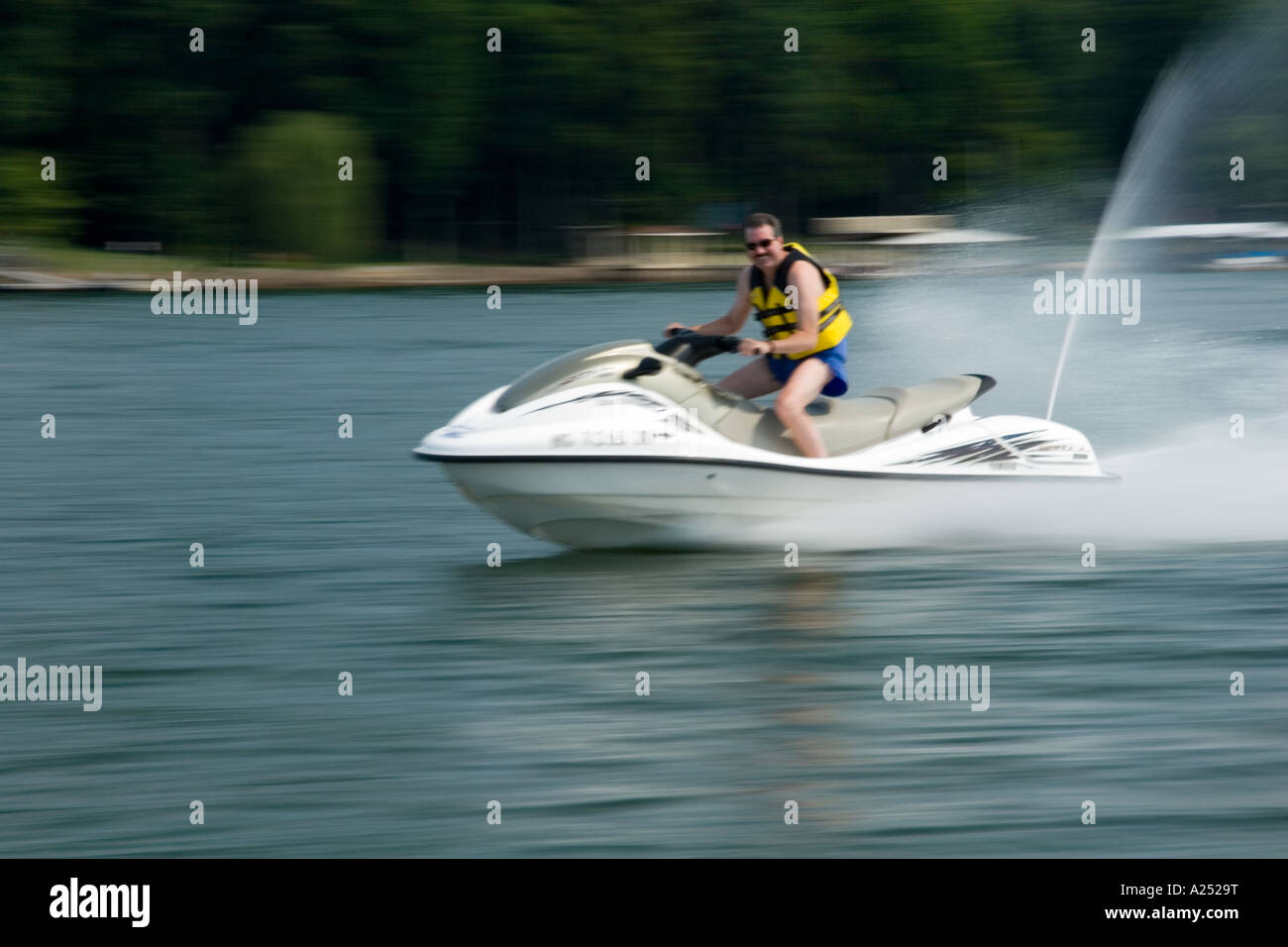 Man on jet ski Stock Photo - Alamy