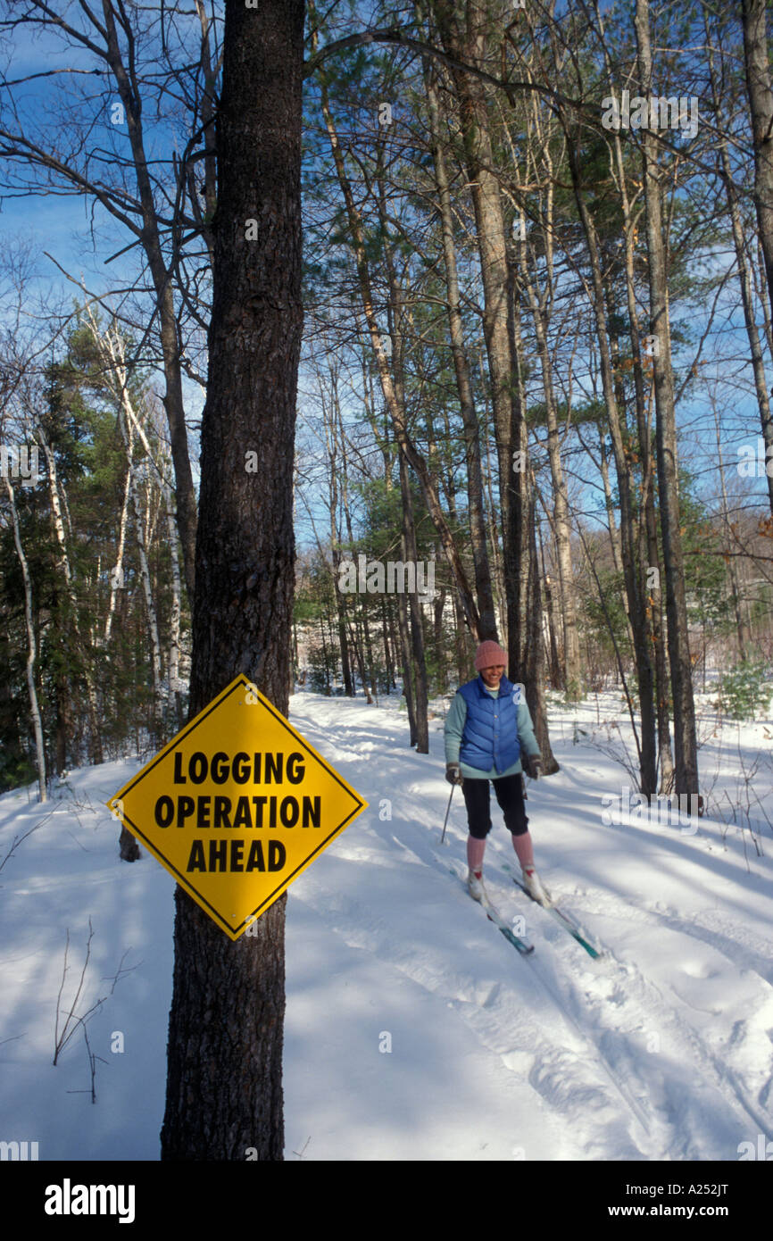 Sign Warns of Logging on Ski Trail Stock Photo - Alamy