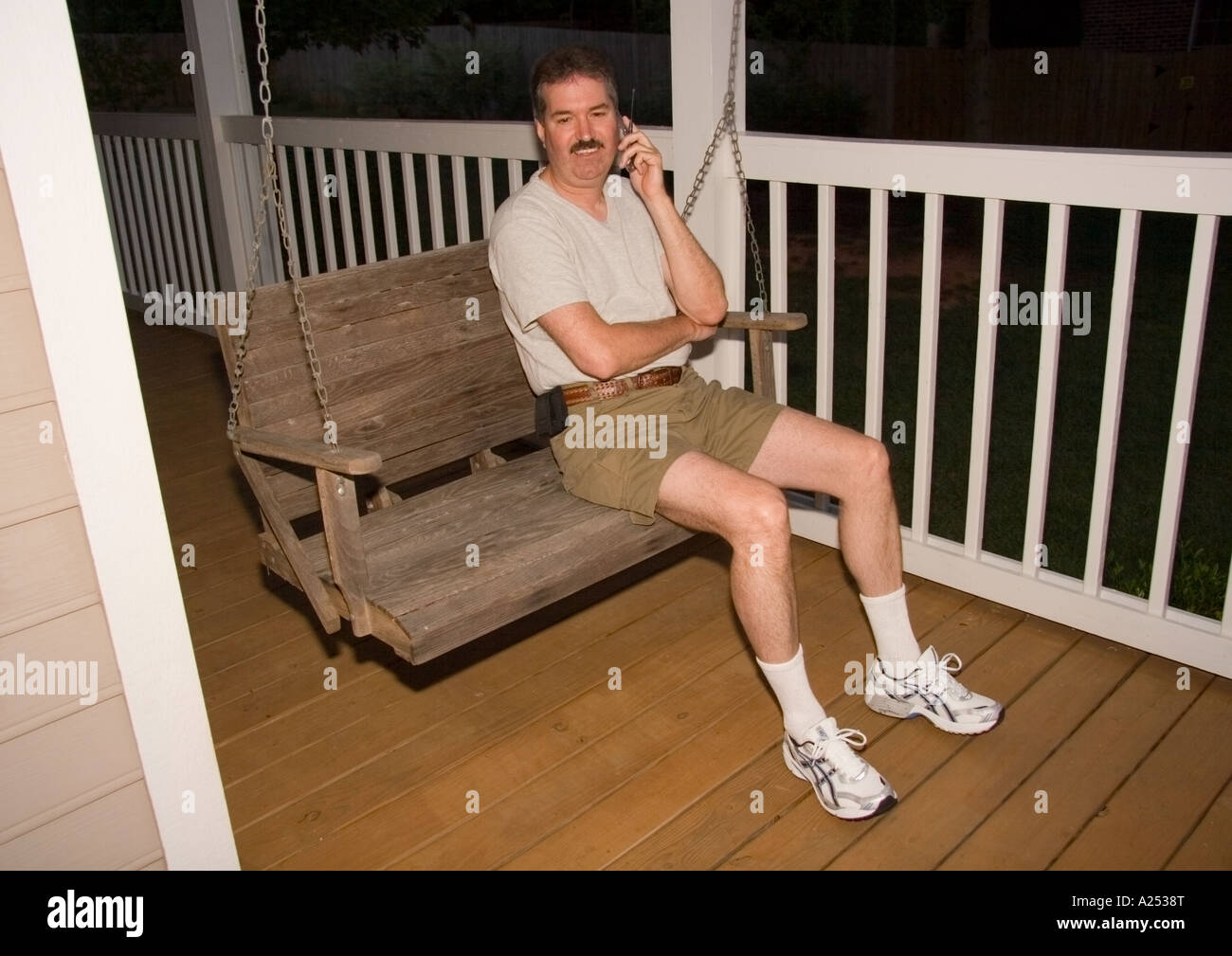 Man in shorts phone hi-res stock photography and images - Alamy