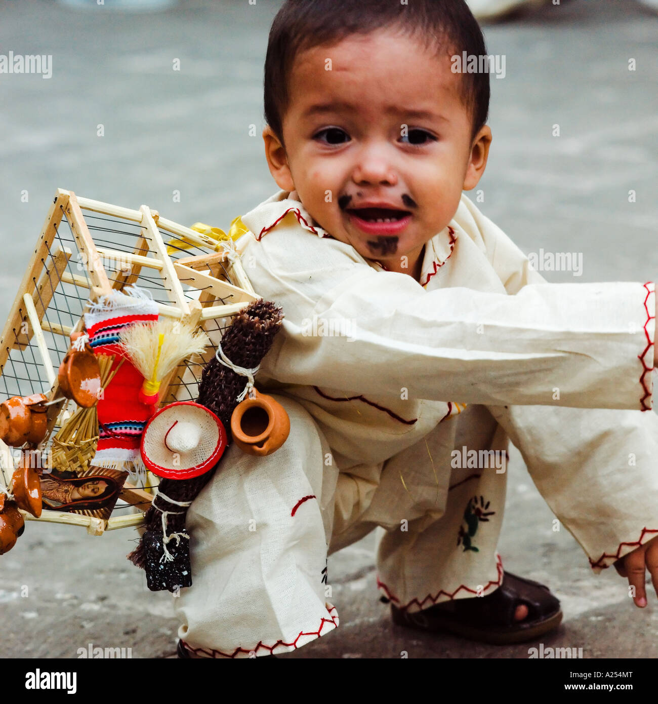 A boy dressed as Juan Diego on the Day of the Virgin in Mazatlan ...