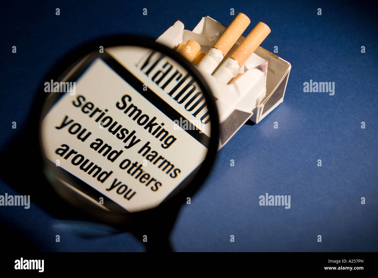 Cigarette packet health warning hi-res stock photography and images - Alamy