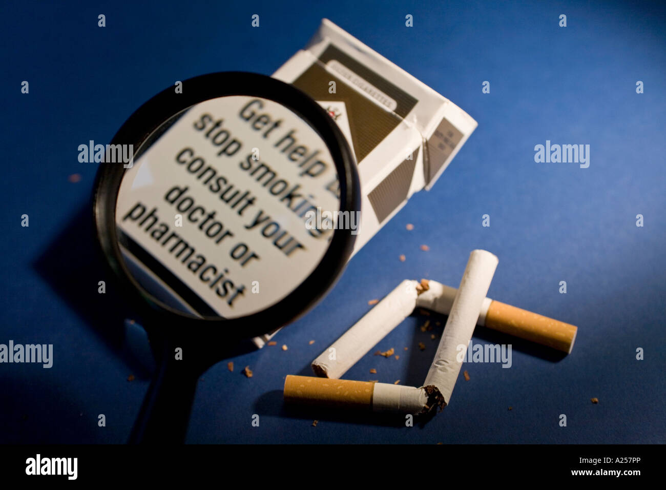 Cigarette packet health warning hi-res stock photography and images - Alamy