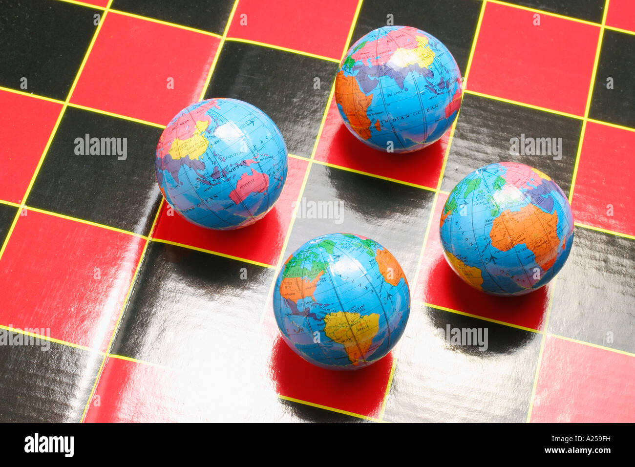 Globes on Game Board Stock Photo - Alamy