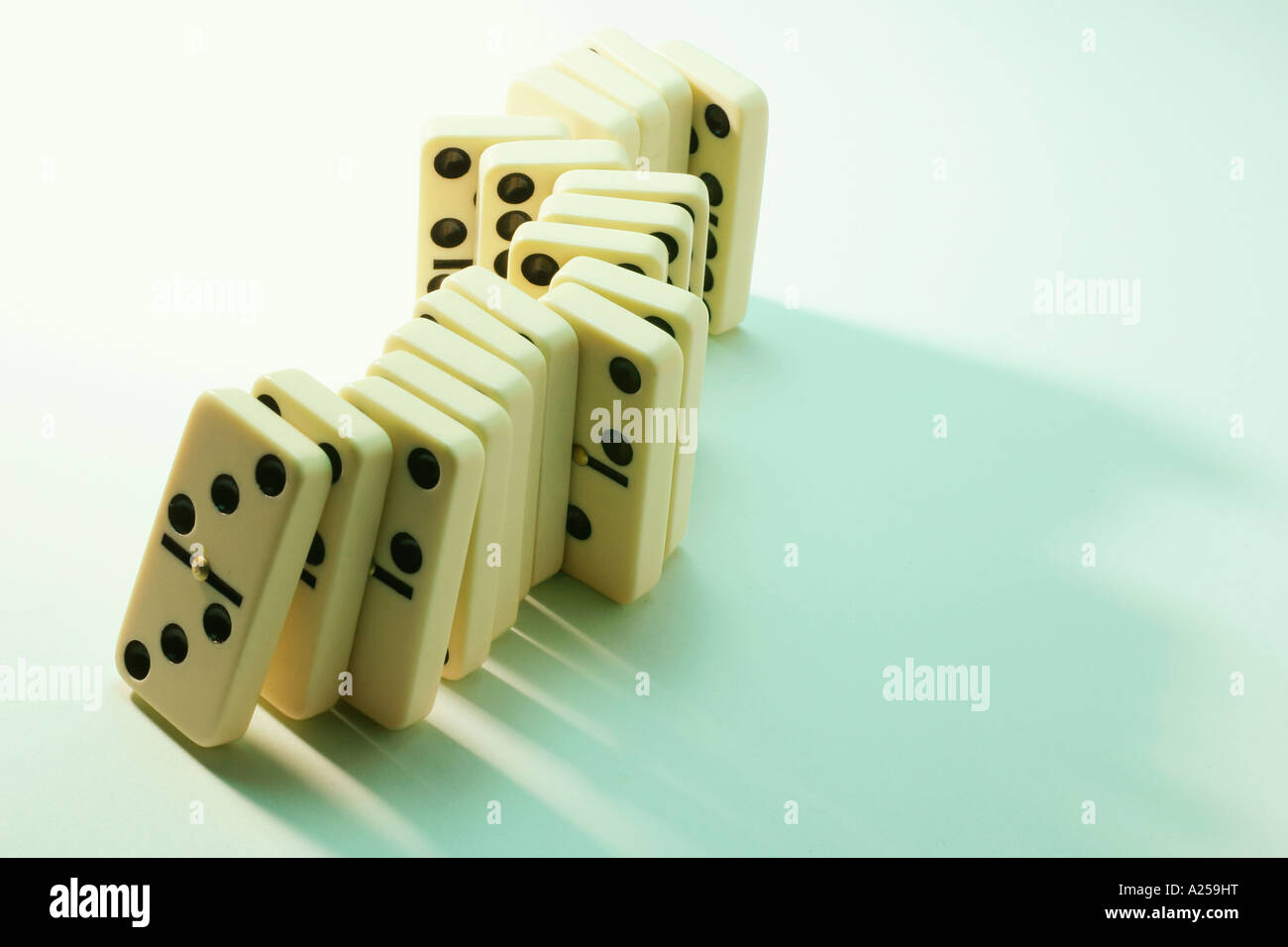 Falling dominoes hi-res stock photography and images - Alamy
