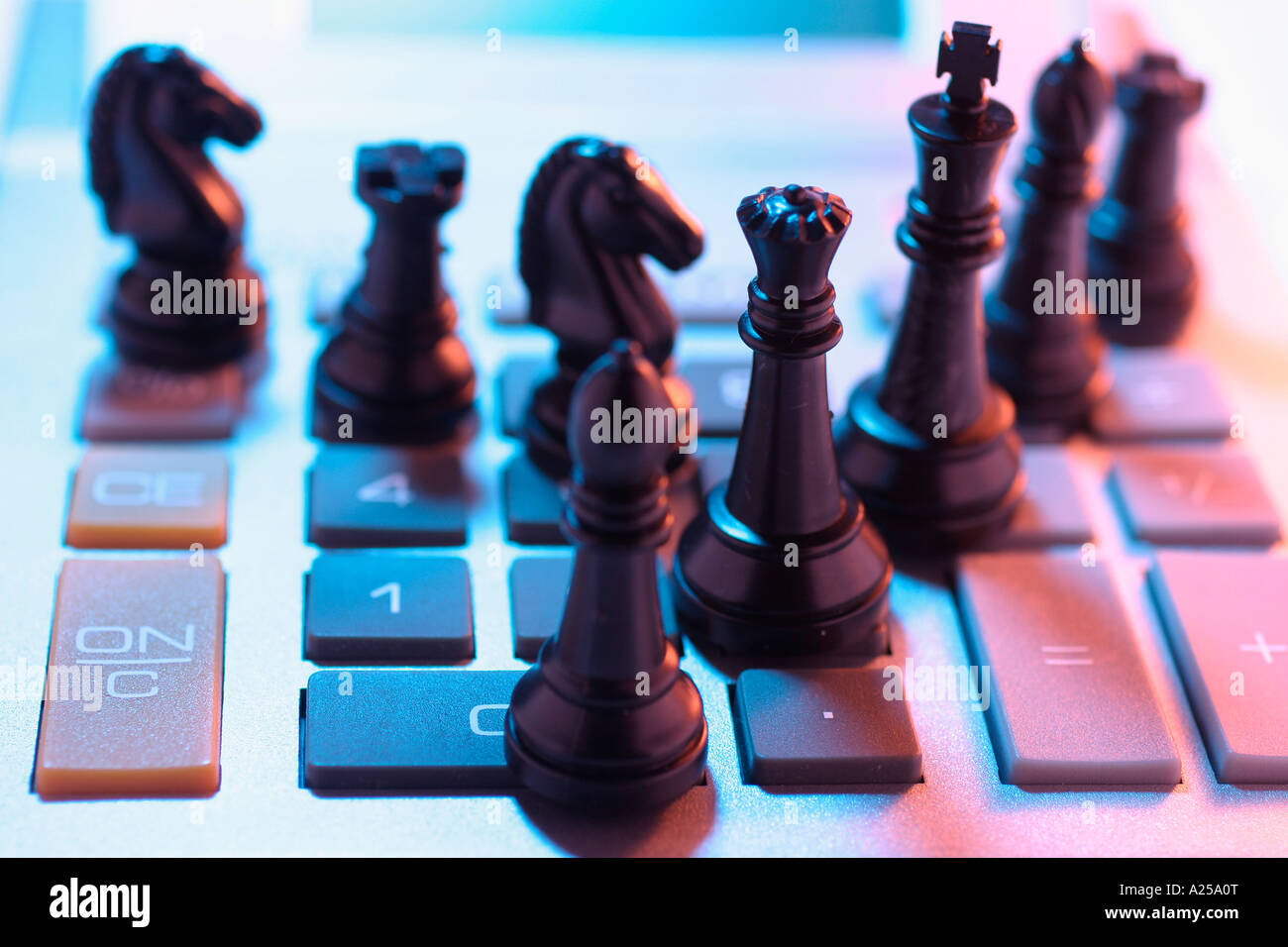 Chess Pieces on Calculator Stock Photo - Alamy