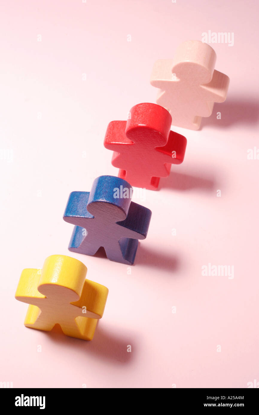 Row of Wooden Children Figures Stock Photo - Alamy