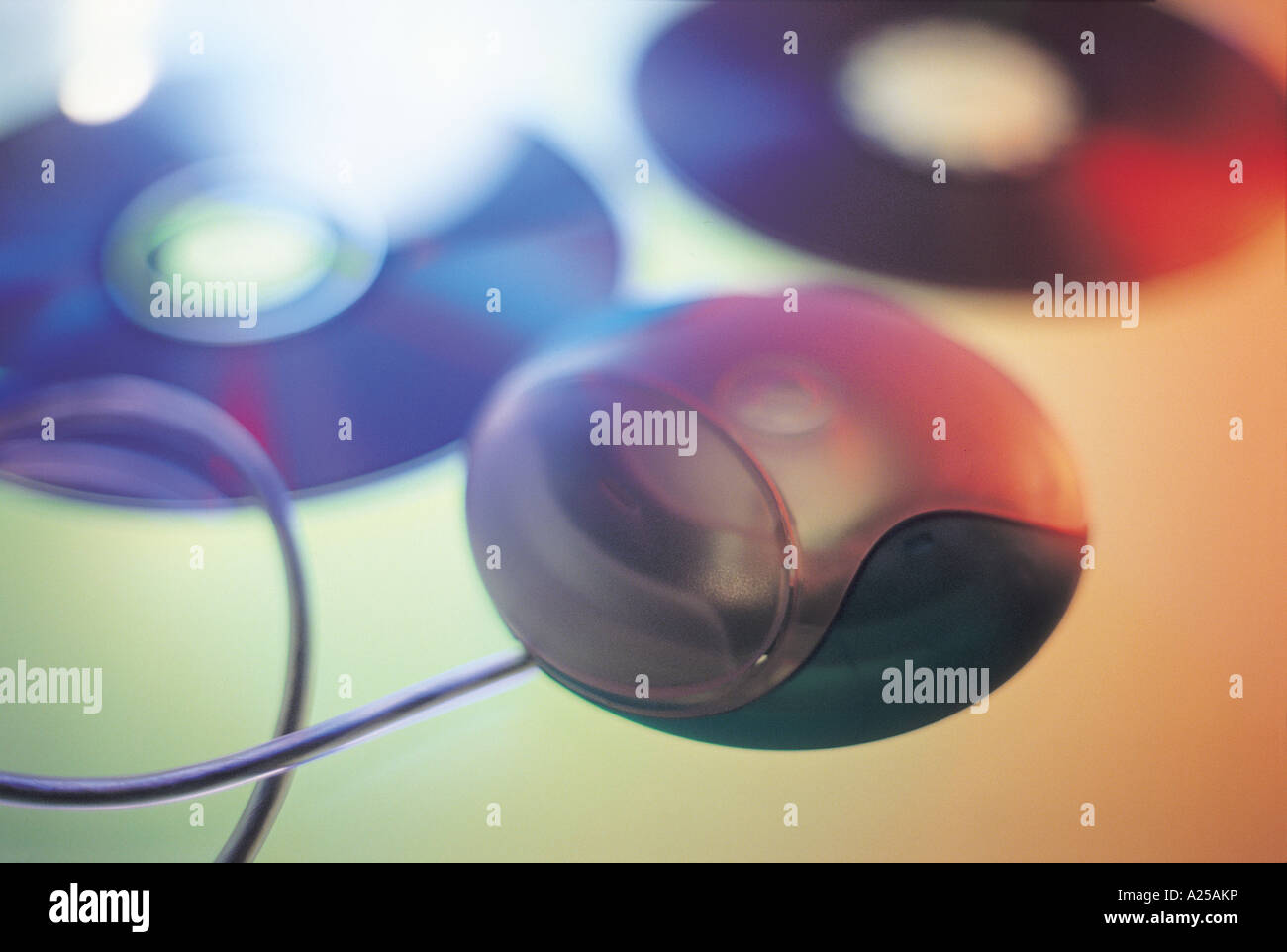 Computer Mouse with CDs Stock Photo - Alamy