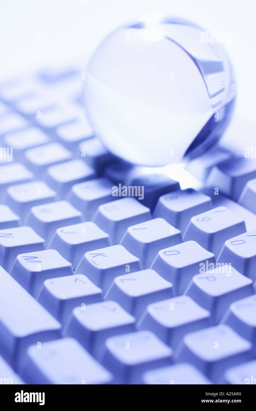 Crystal Ball on Computer Keyboard Stock Photo - Alamy