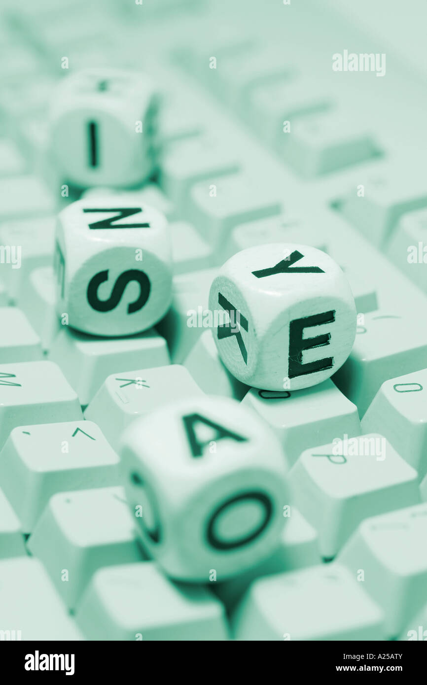 Alphabet Dice on Keyboard Stock Photo - Alamy