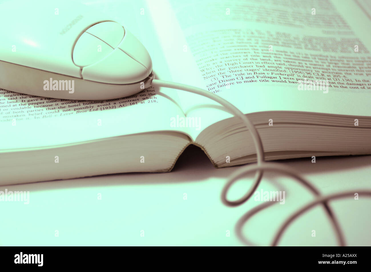 Computer Mouse on Book Stock Photo - Alamy