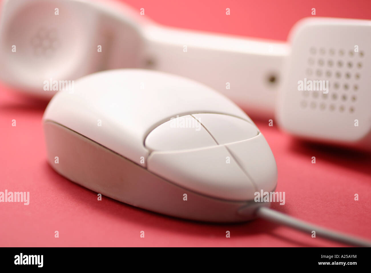 Computer Mouse and Phone Receiver Stock Photo - Alamy