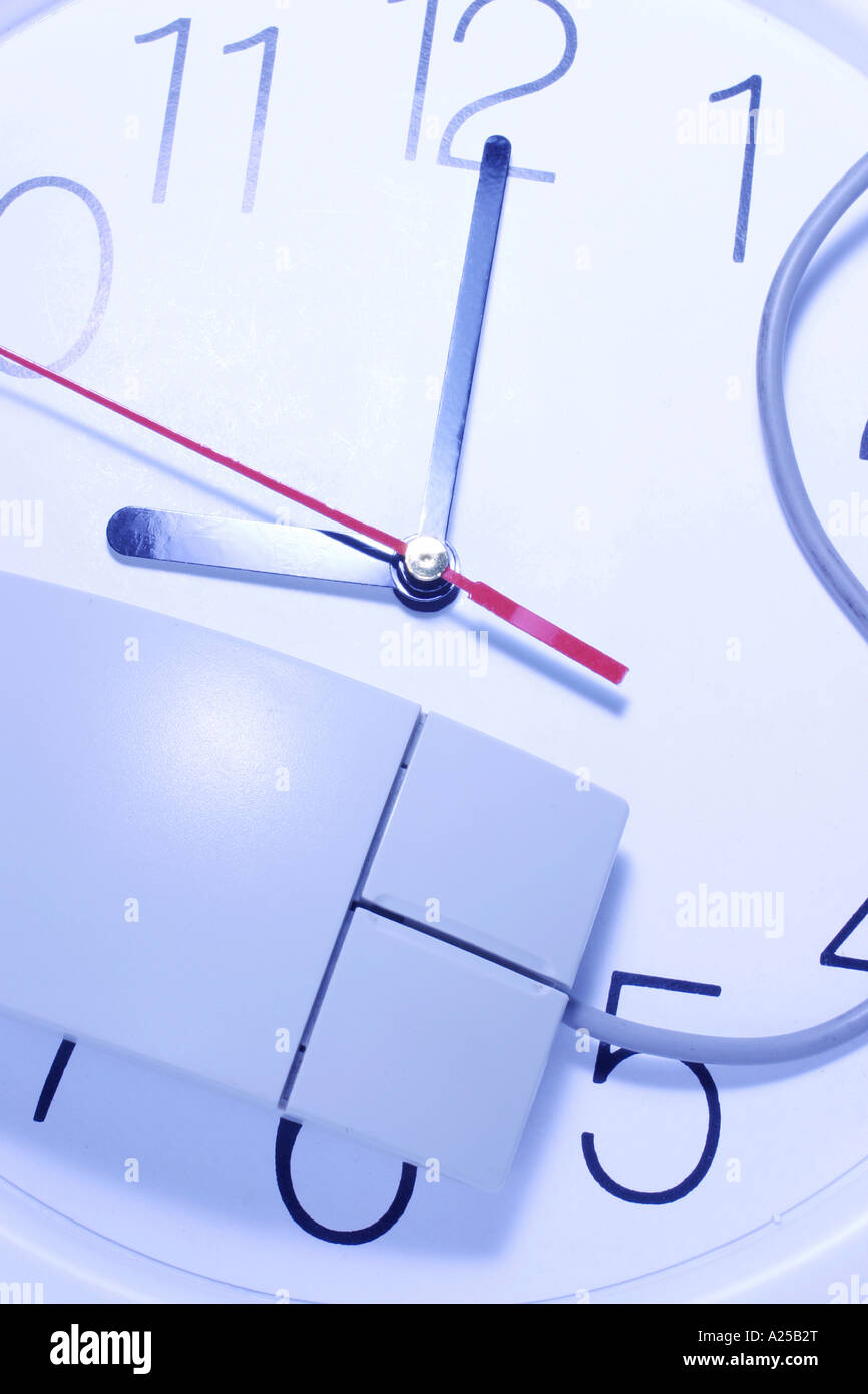 Computer Mouse on Clock Stock Photo - Alamy