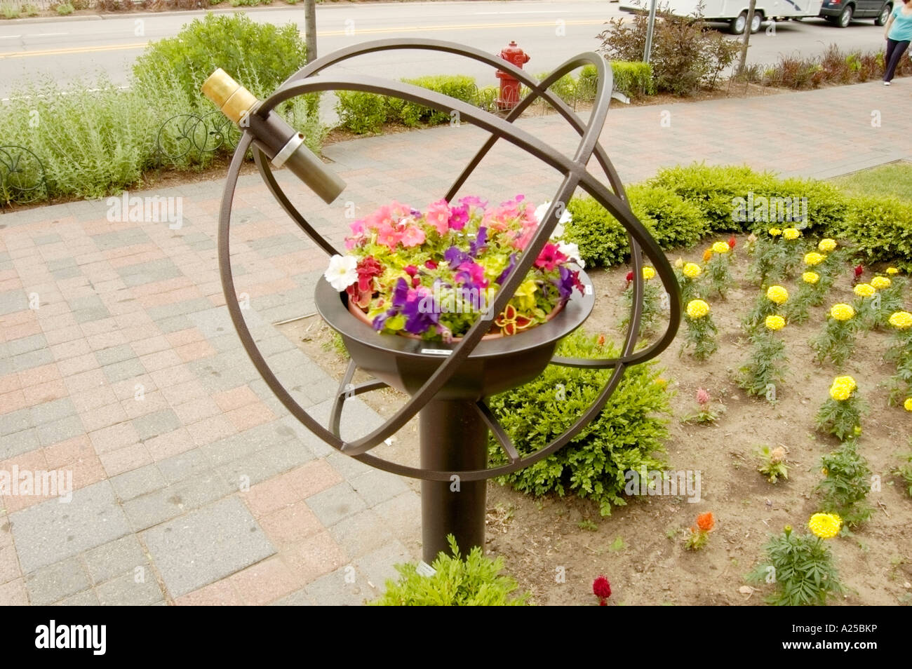 Flowers in container that can be spun Stock Photo - Alamy