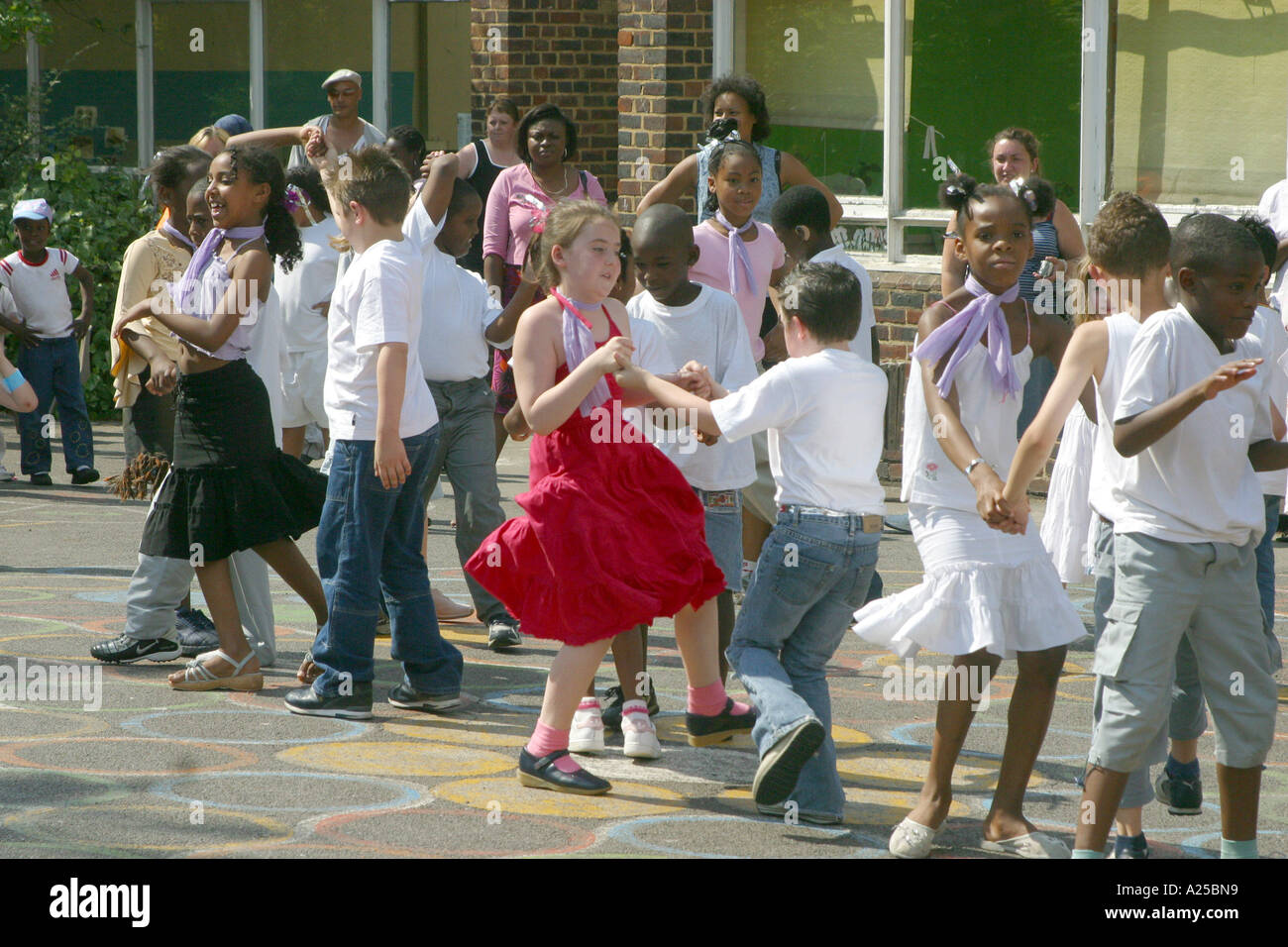primary school children learning to dance in the playground Stock Photo ...