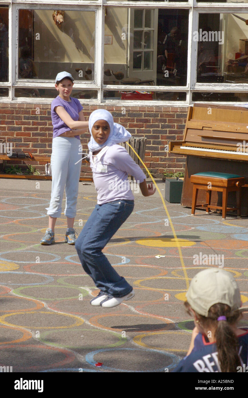 Girls in playground at school hi-res stock photography and images - Alamy
