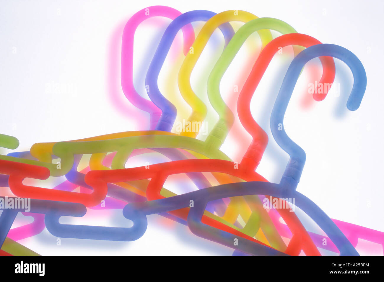 Multi colored plastic clothes hangers hi-res stock photography and ...