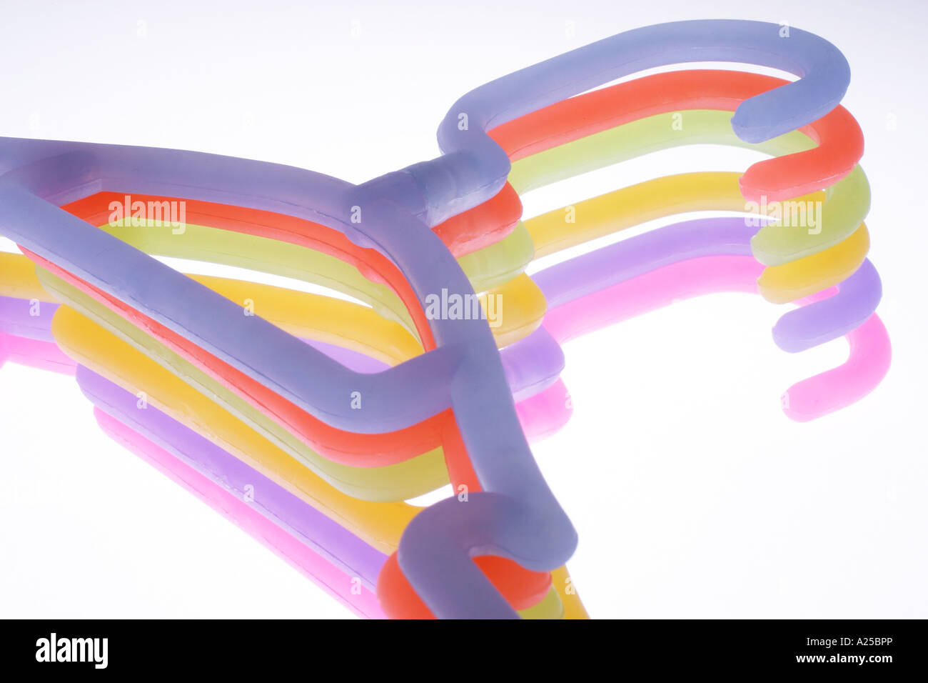 Multi colored plastic clothes hangers hi-res stock photography and ...
