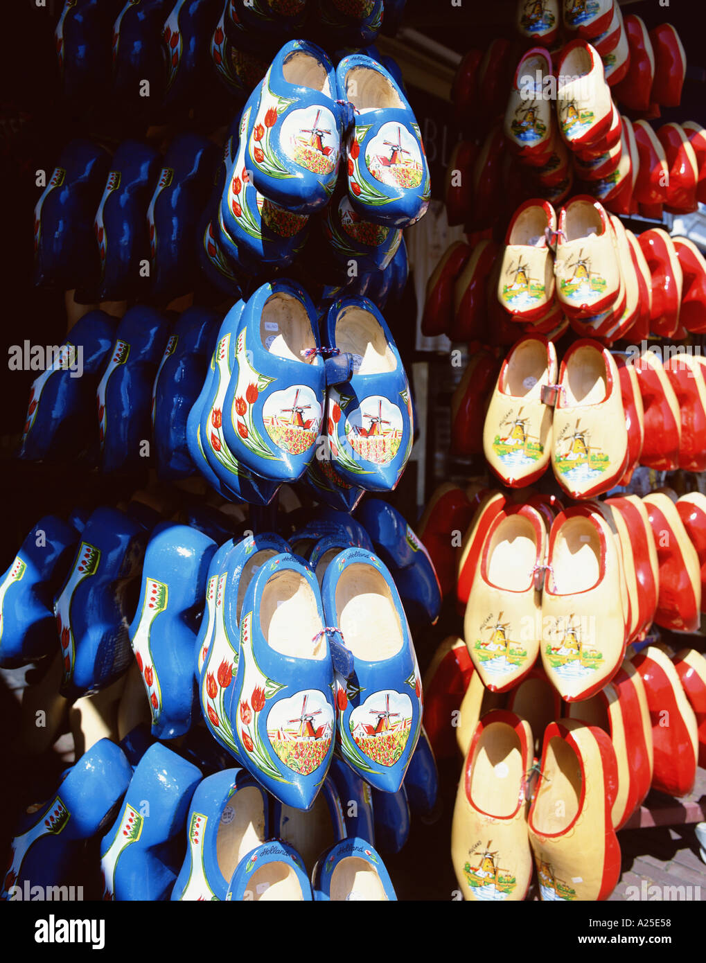 PAINTED CLOGS HANGING IN ROWS HOLLAND Stock Photo - Alamy