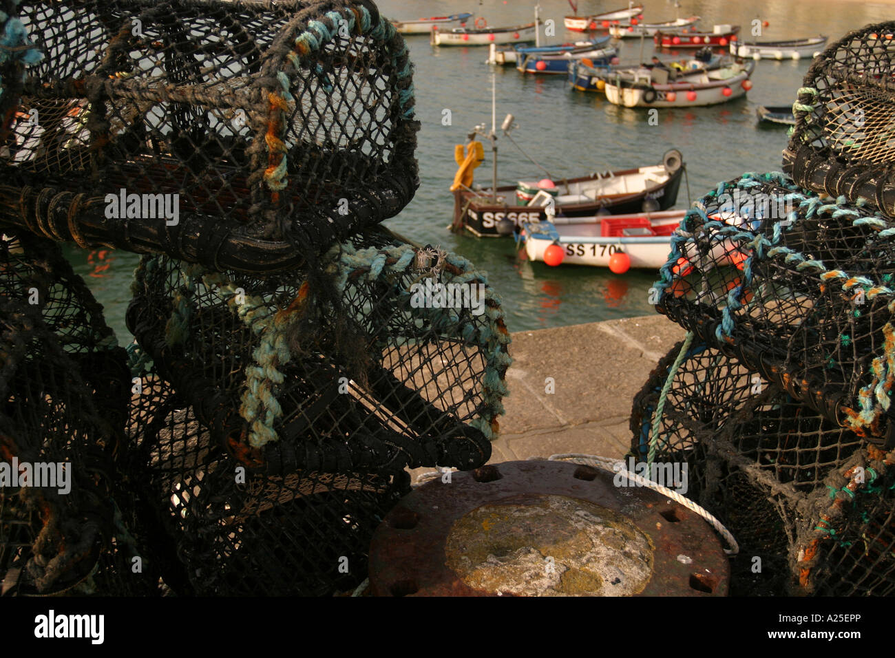 Lobster pots on harbour wall Hayle West Cornwall UK Stock Photo - Alamy