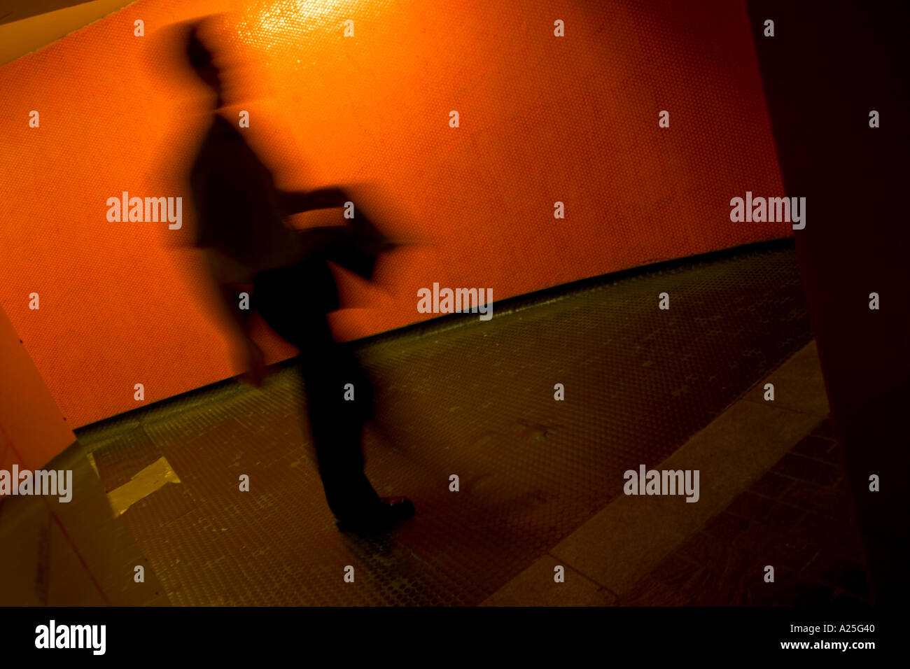 Person entering a train station Stock Photo - Alamy