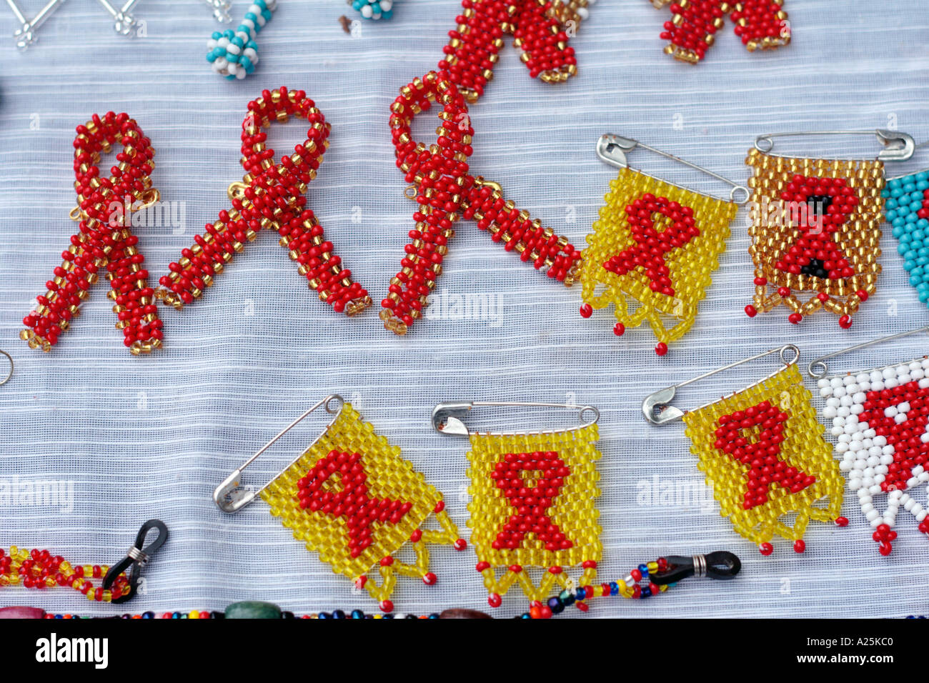Bead beadwork HIV AIDS awareness badges in South Africa Stock Photo - Alamy