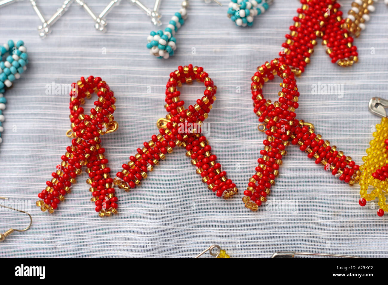 Bead beadwork HIV AIDS awareness badges in South Africa Stock Photo - Alamy