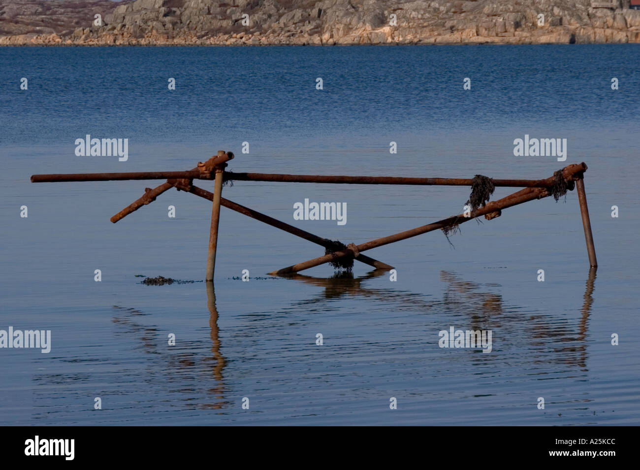 Metal construction in water Stock Photo - Alamy