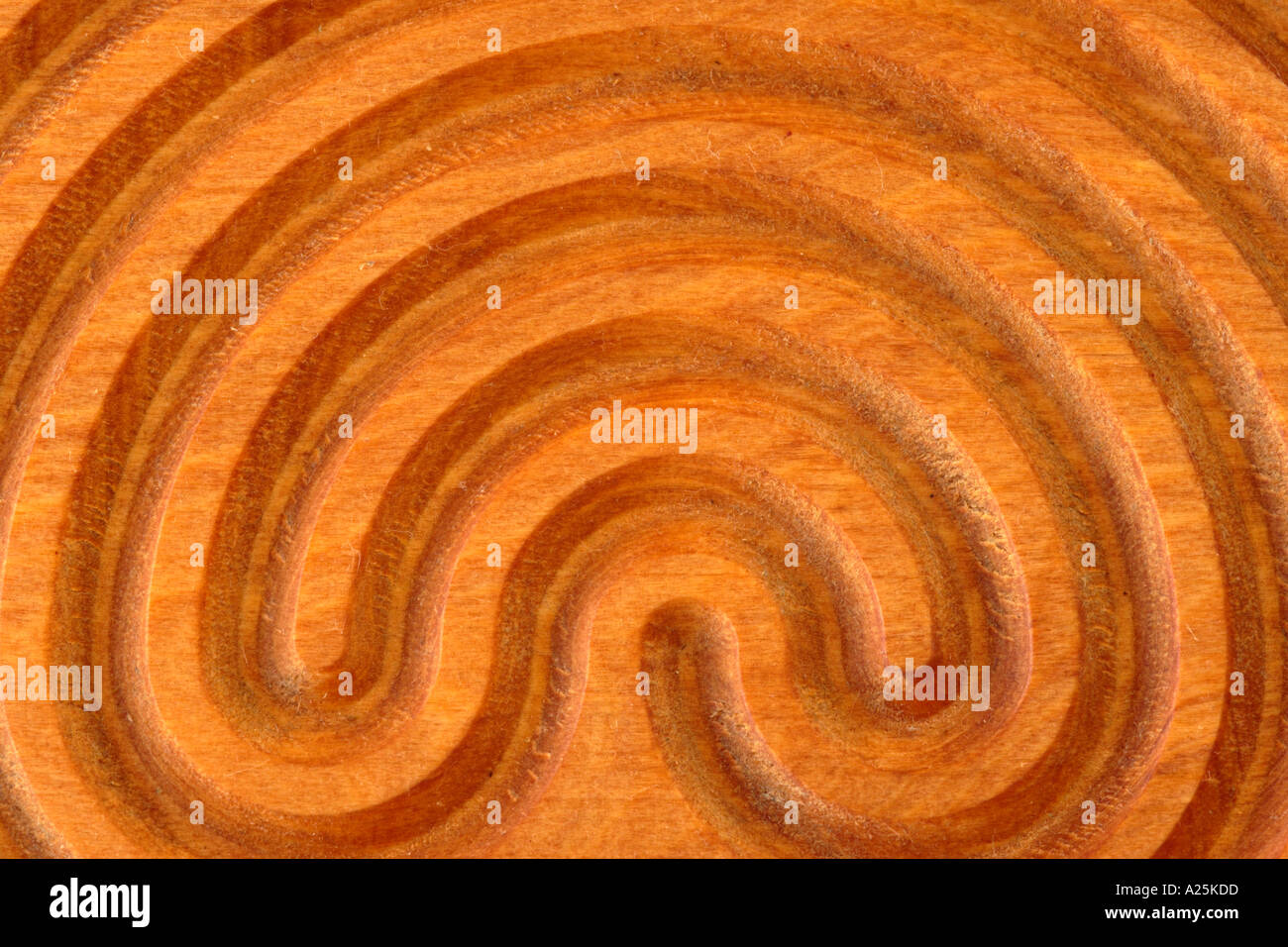 Spiral labyrinth pattern in wood for background Stock Photo - Alamy