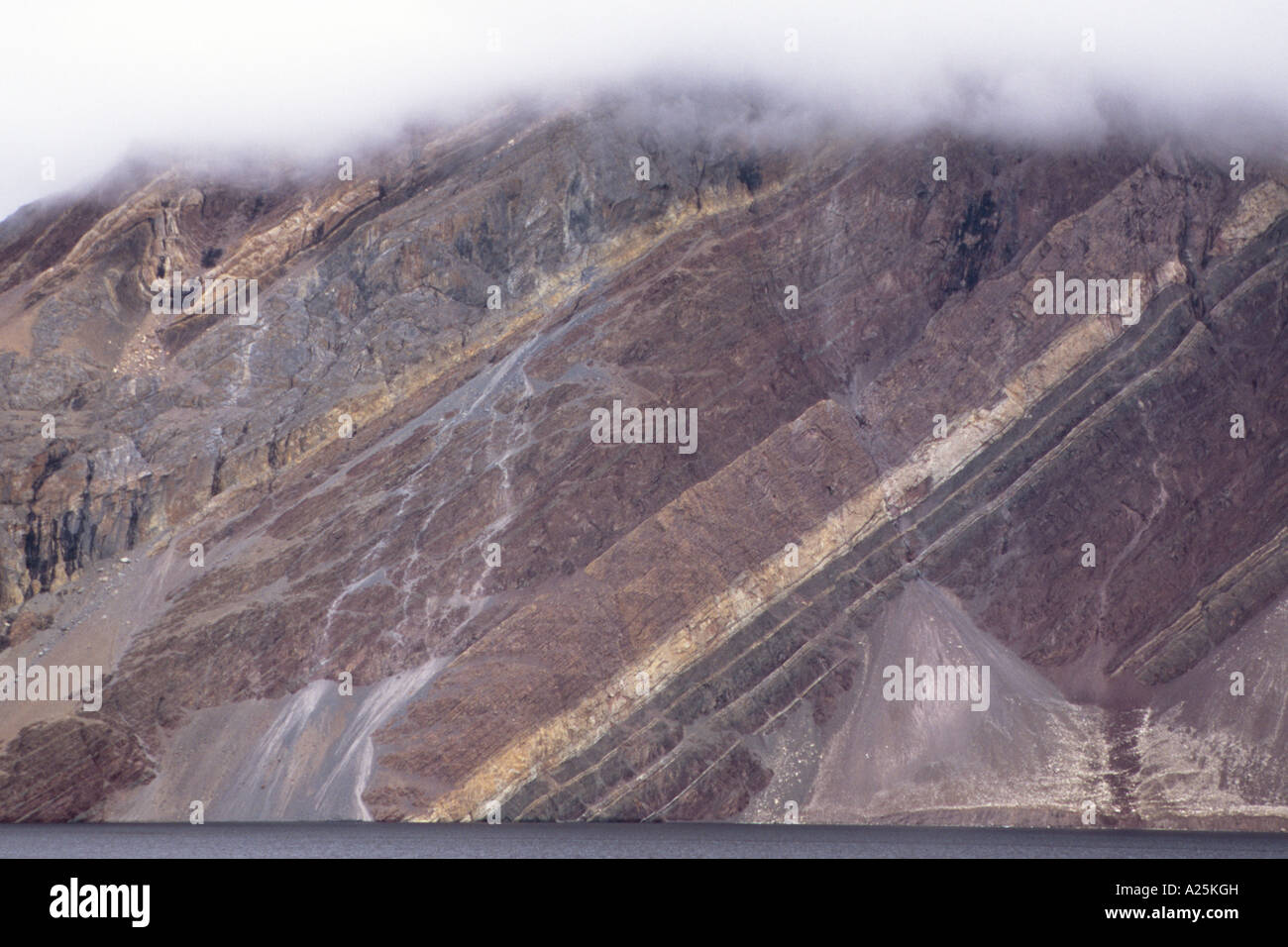 rocky coast at Antarctic Sund, geologic strata, 600 million years old ...