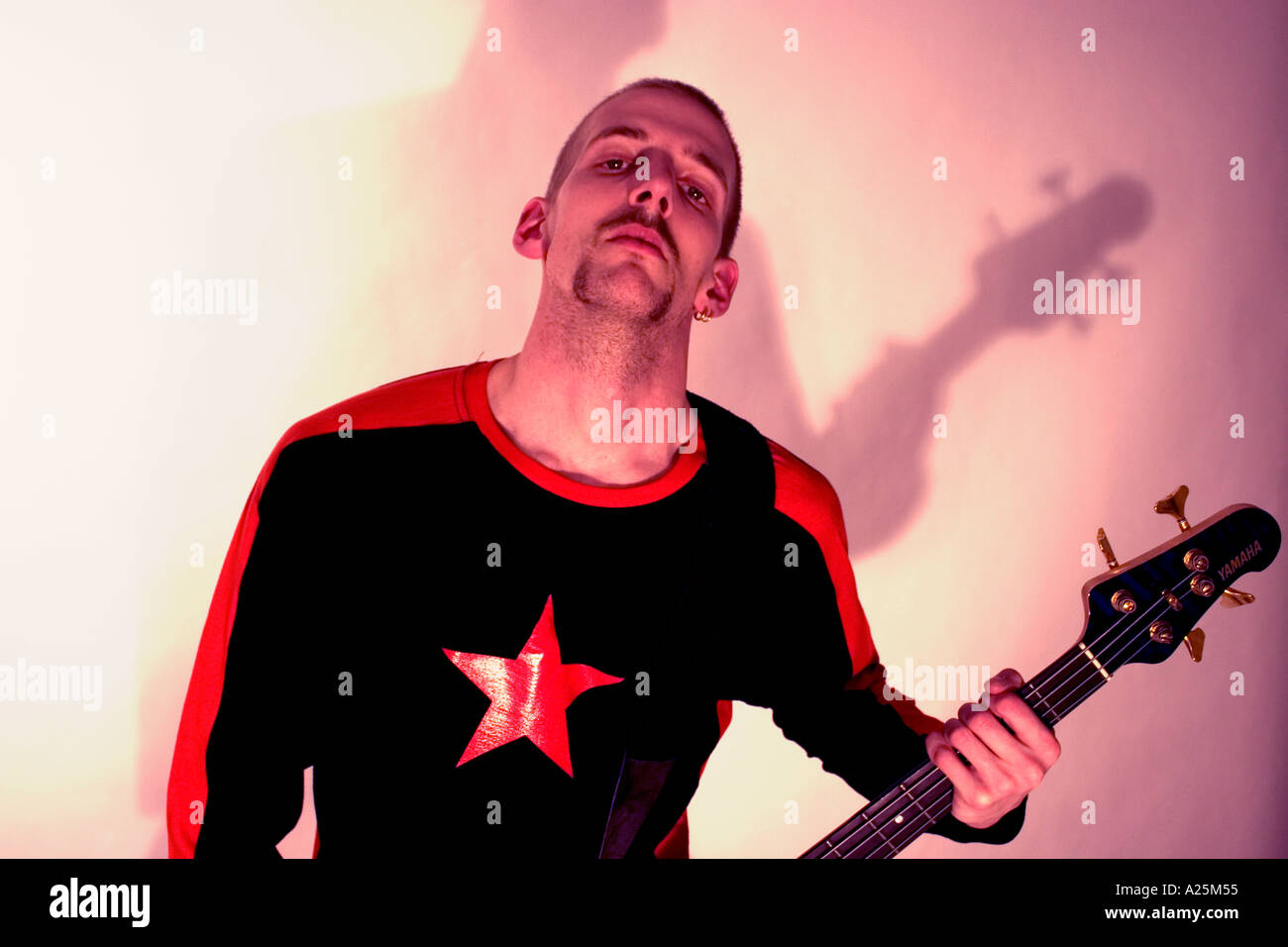 Rock n Roll bass player Stock Photo - Alamy