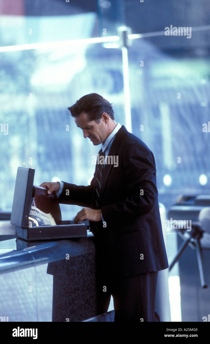 business man at opening breifcase Stock Photo - Alamy