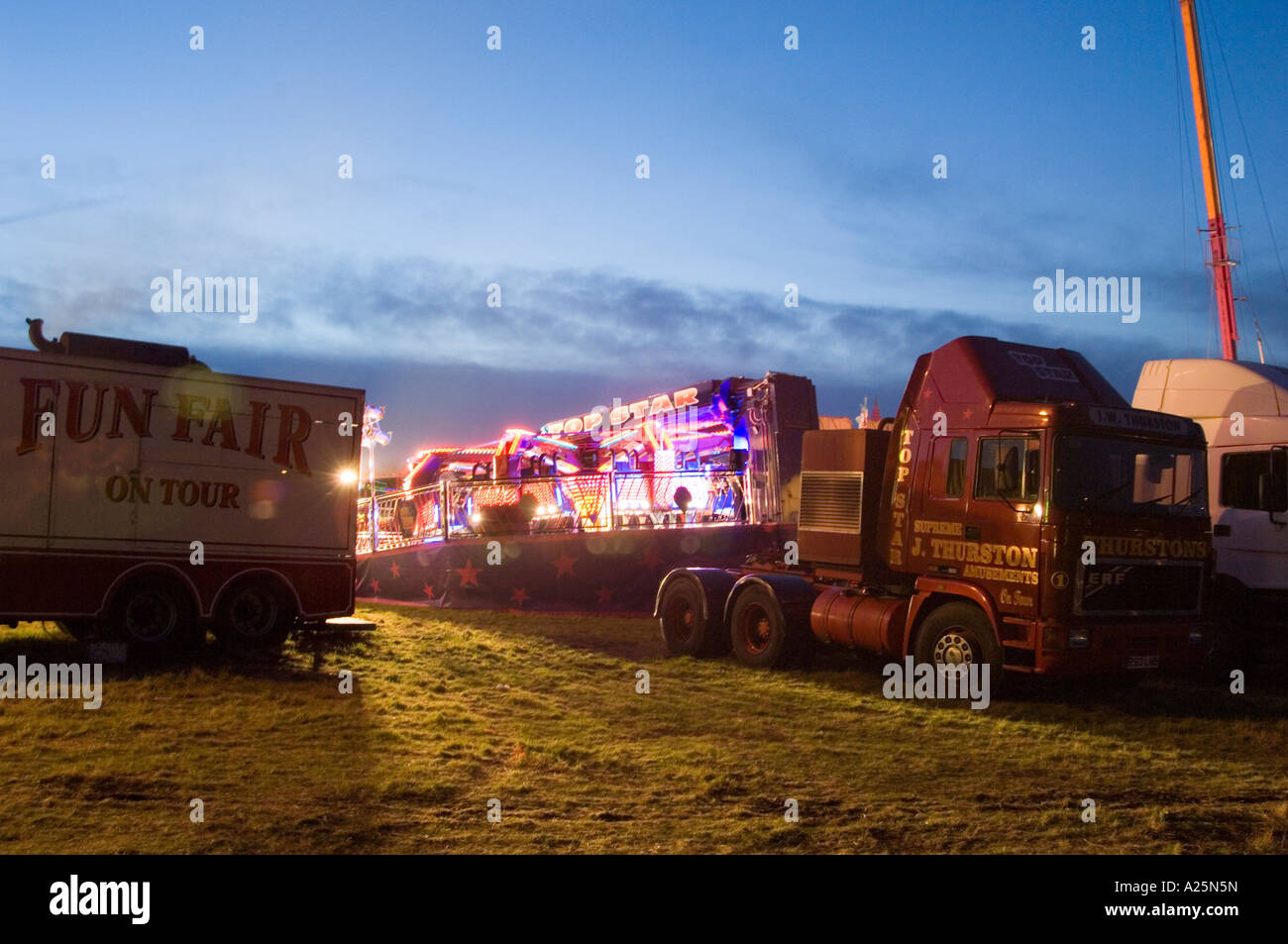 rear view of circus wagons trucks at funfair woolwich london england uk ...