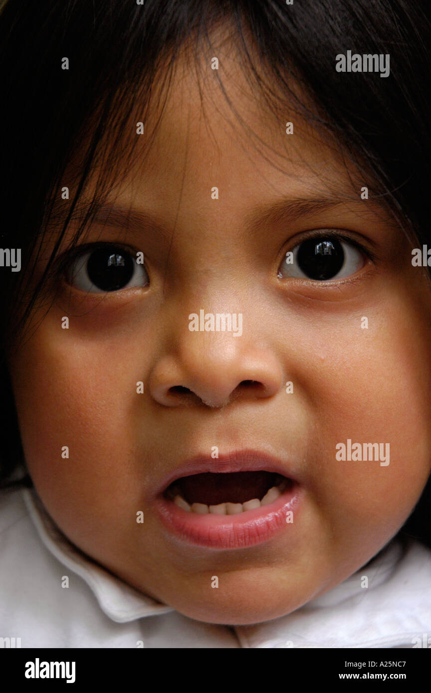 A three year old Mayan baby girl making facial expressions Stock Photo ...