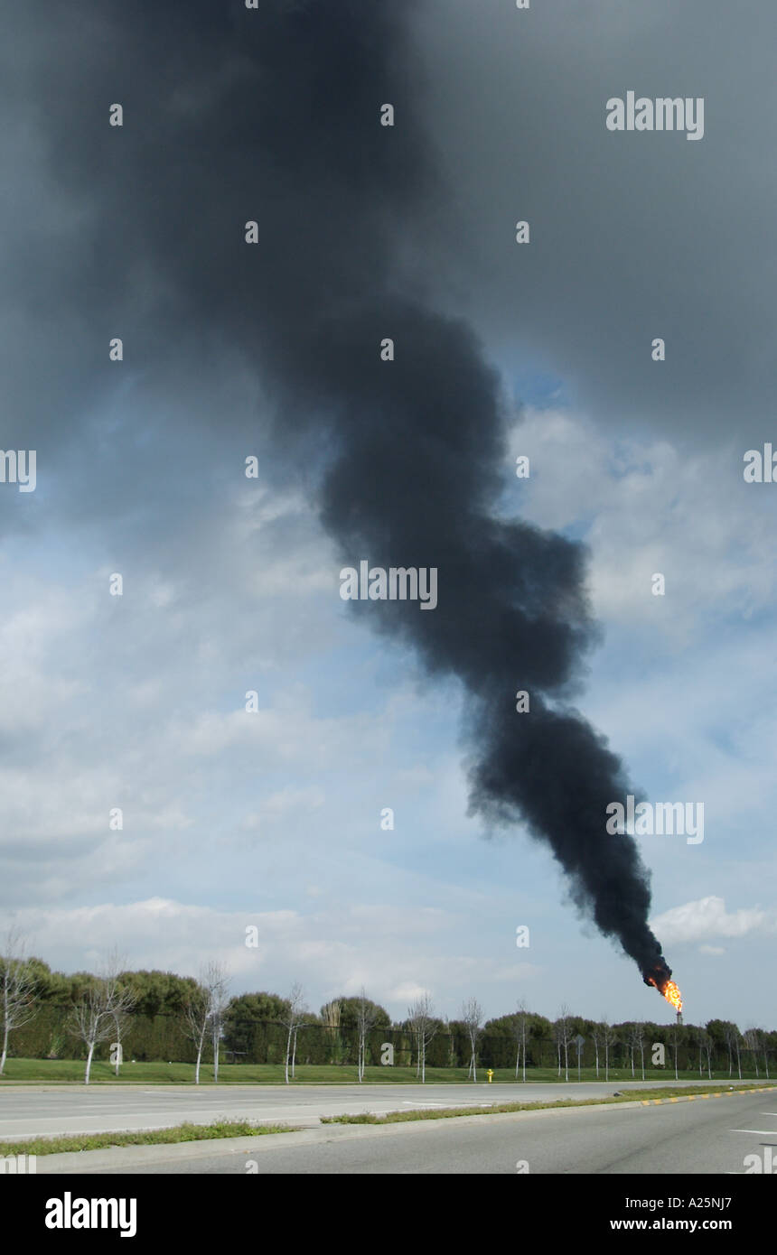 Intense hot fires burning from oil refinery flares Stock Photo - Alamy