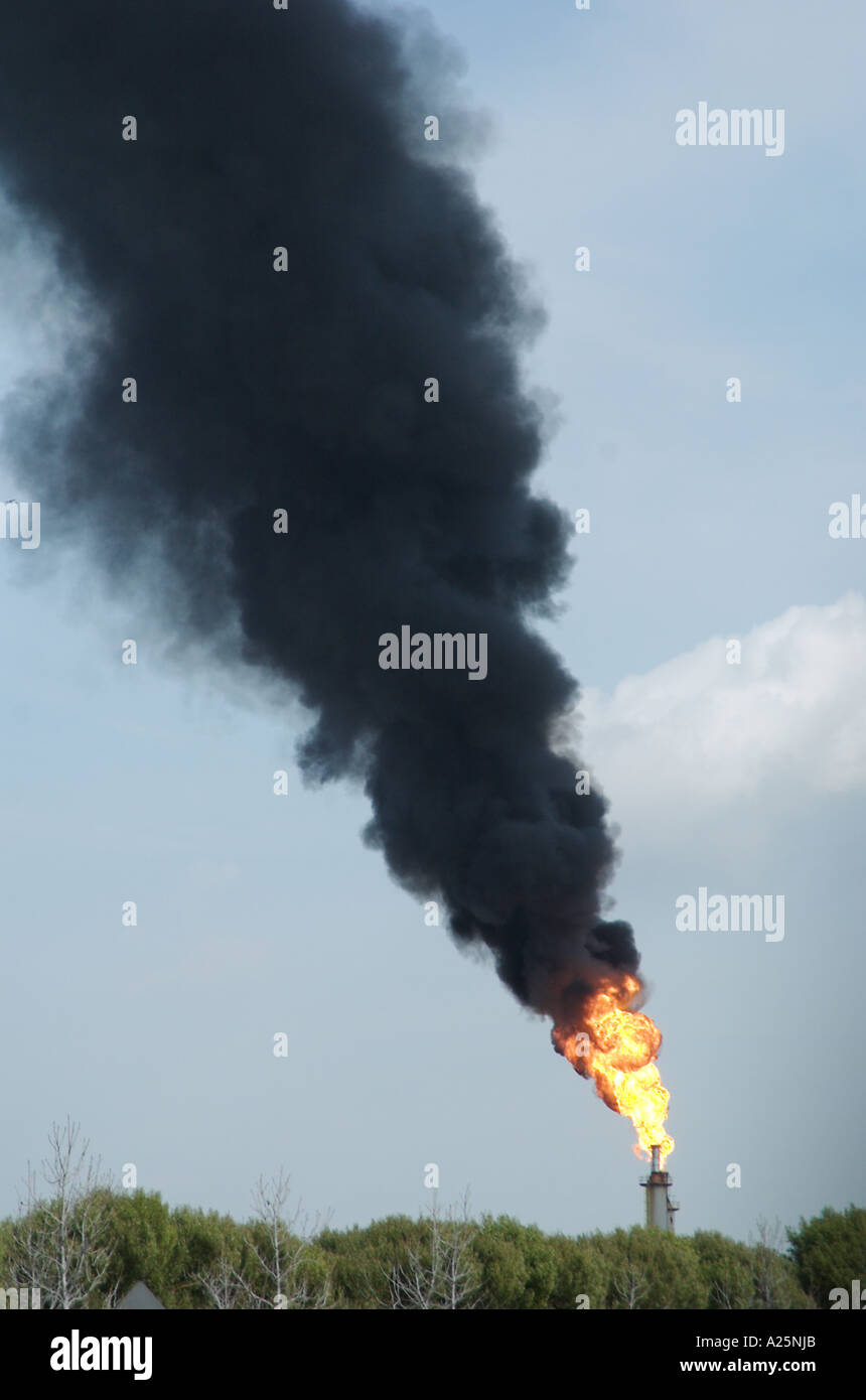 Intense hot fires burning from oil refinery flares Stock Photo - Alamy