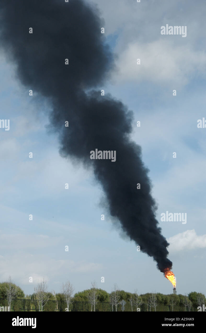 Intense hot fires burning from oil refinery flares Stock Photo - Alamy