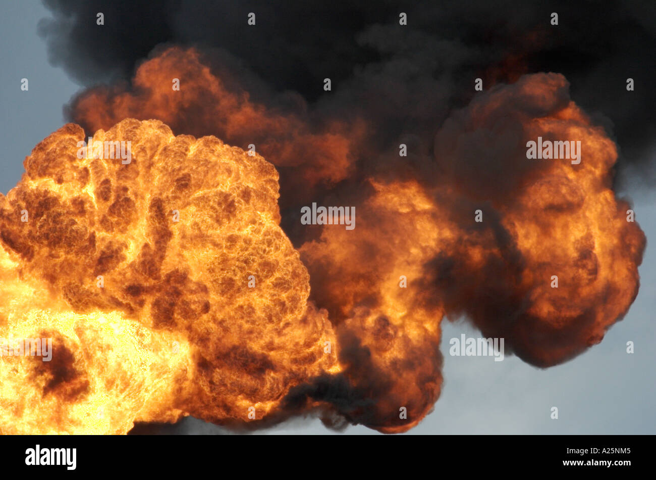 Intense hot fires burning from oil refinery flares Stock Photo - Alamy