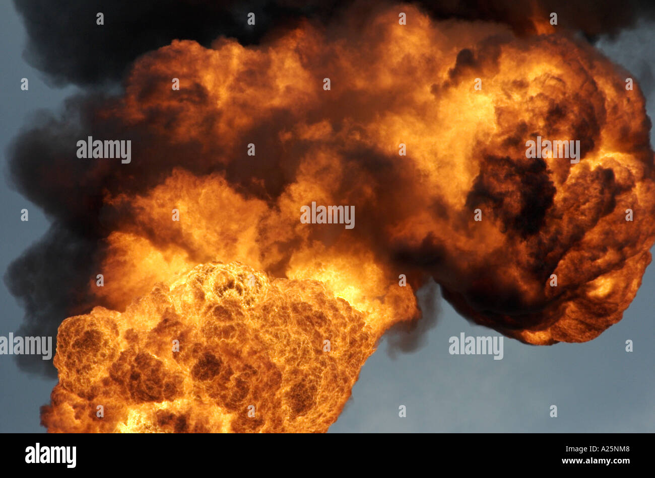 Intense hot fires burning from oil refinery flares Stock Photo - Alamy