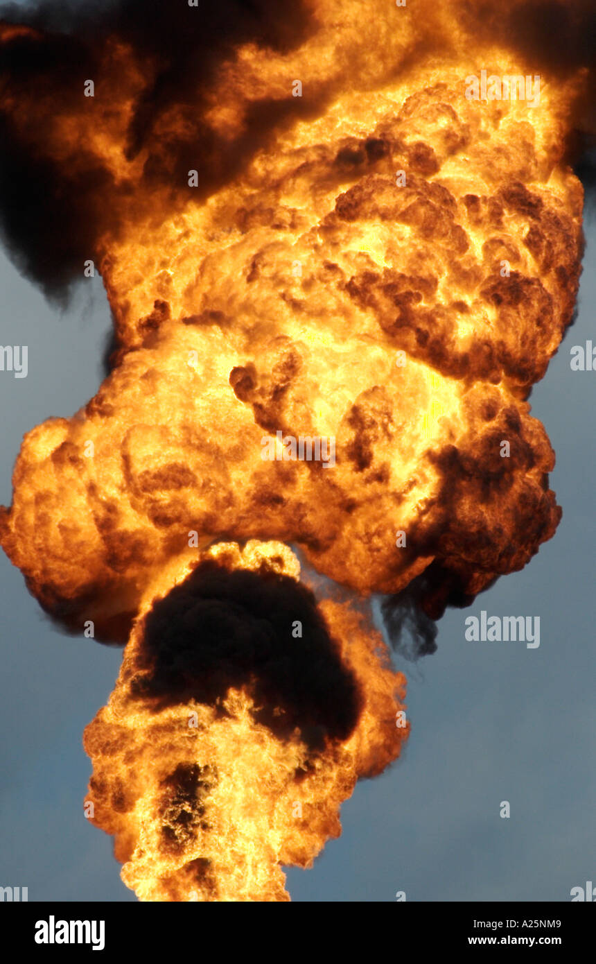 Intense hot fires burning from oil refinery flares Stock Photo - Alamy